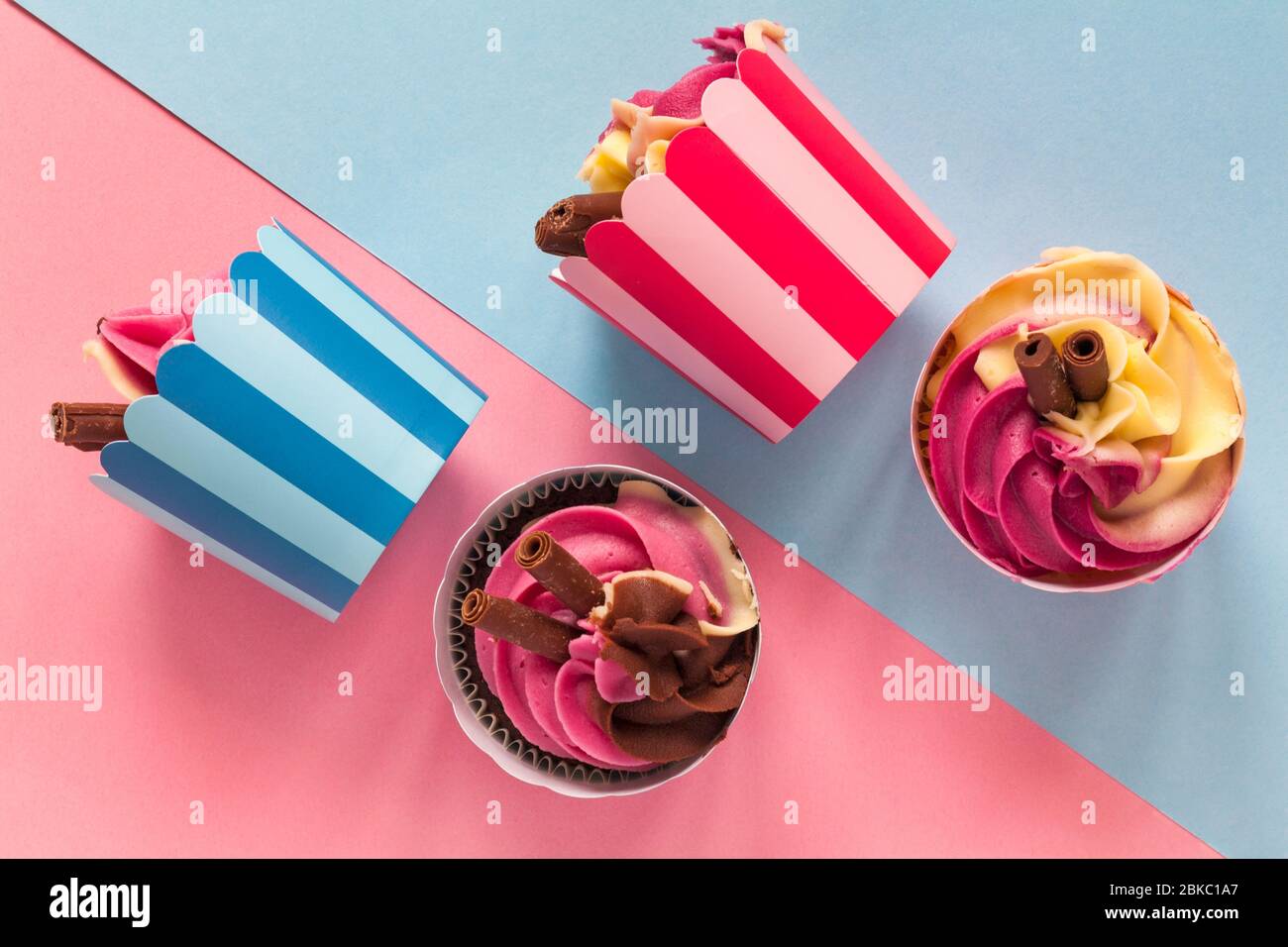 M&S Raspberry Ripple Sundae Cake & Neapolitan Sundae Cake set on pale ...