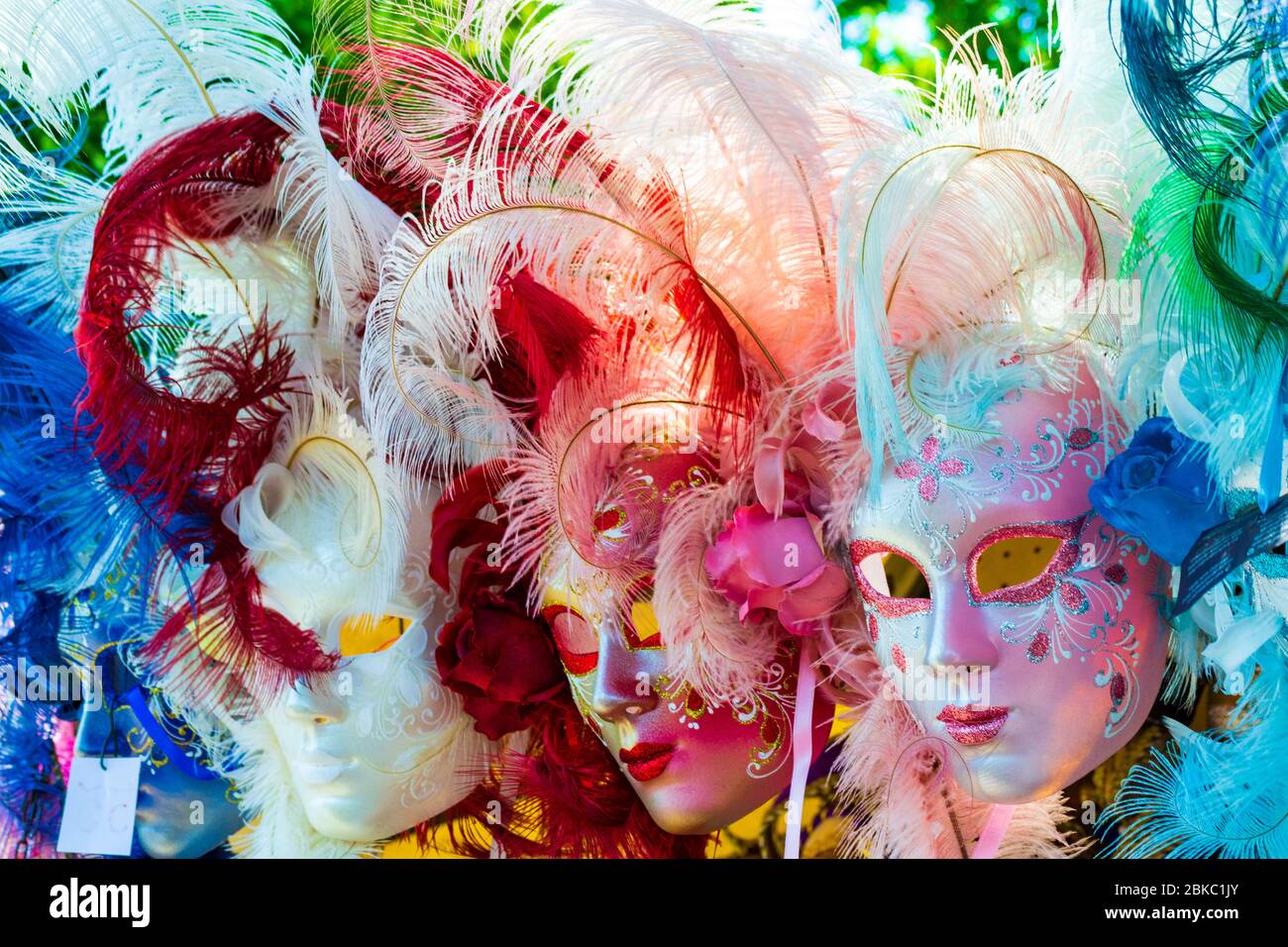 Picturesque traditional venetian carnival masks displayed on vendor ...
