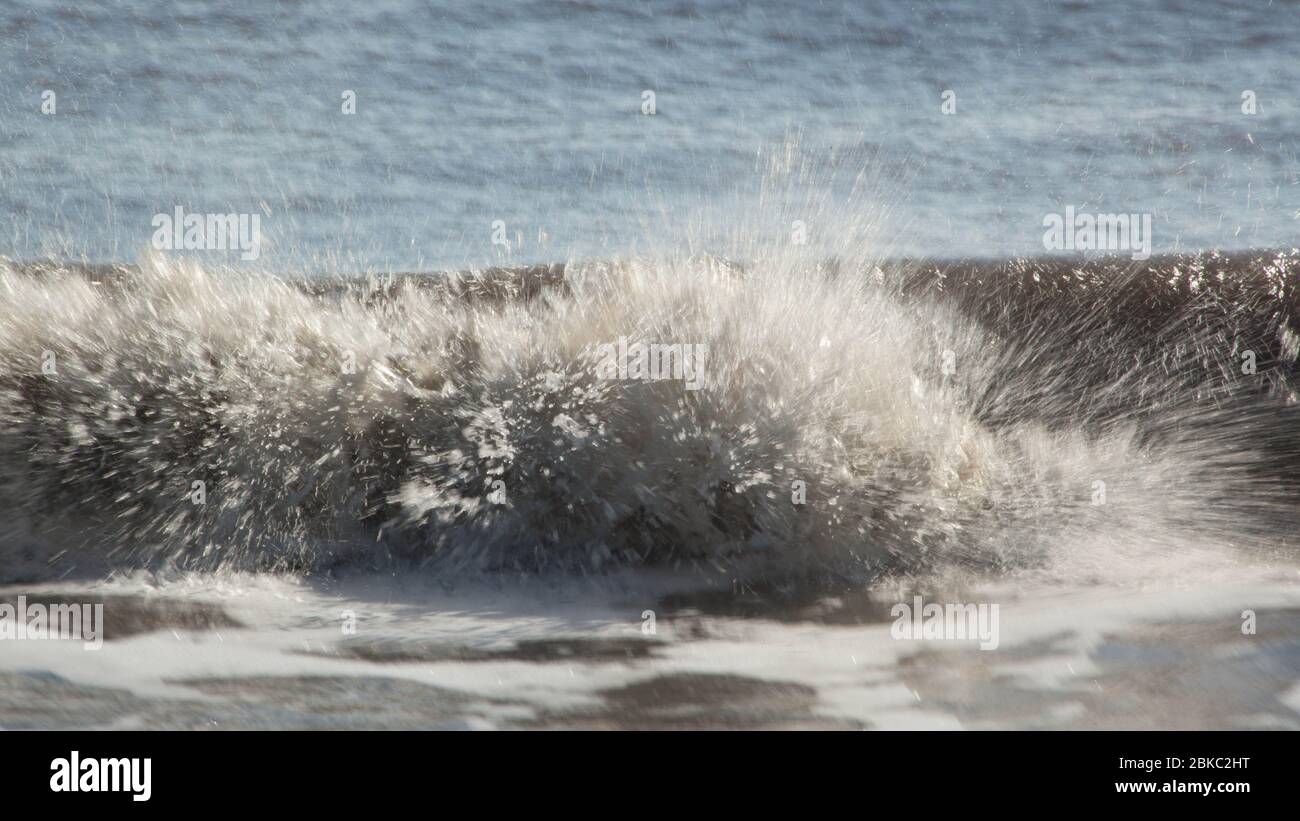 Ocean waves breaking at the beach Stock Photo - Alamy