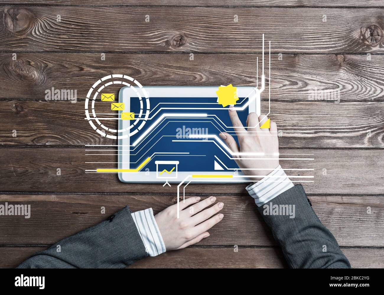 Business workplace with tablet device and media graphs and diagrams ...
