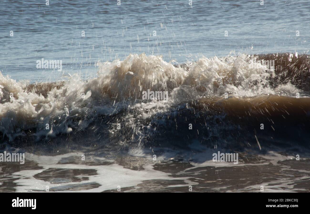 Ocean waves breaking at the beach Stock Photo - Alamy