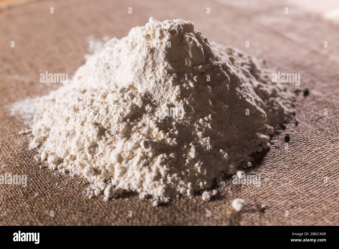 White flour on textile background texture photo Stock Photo - Alamy