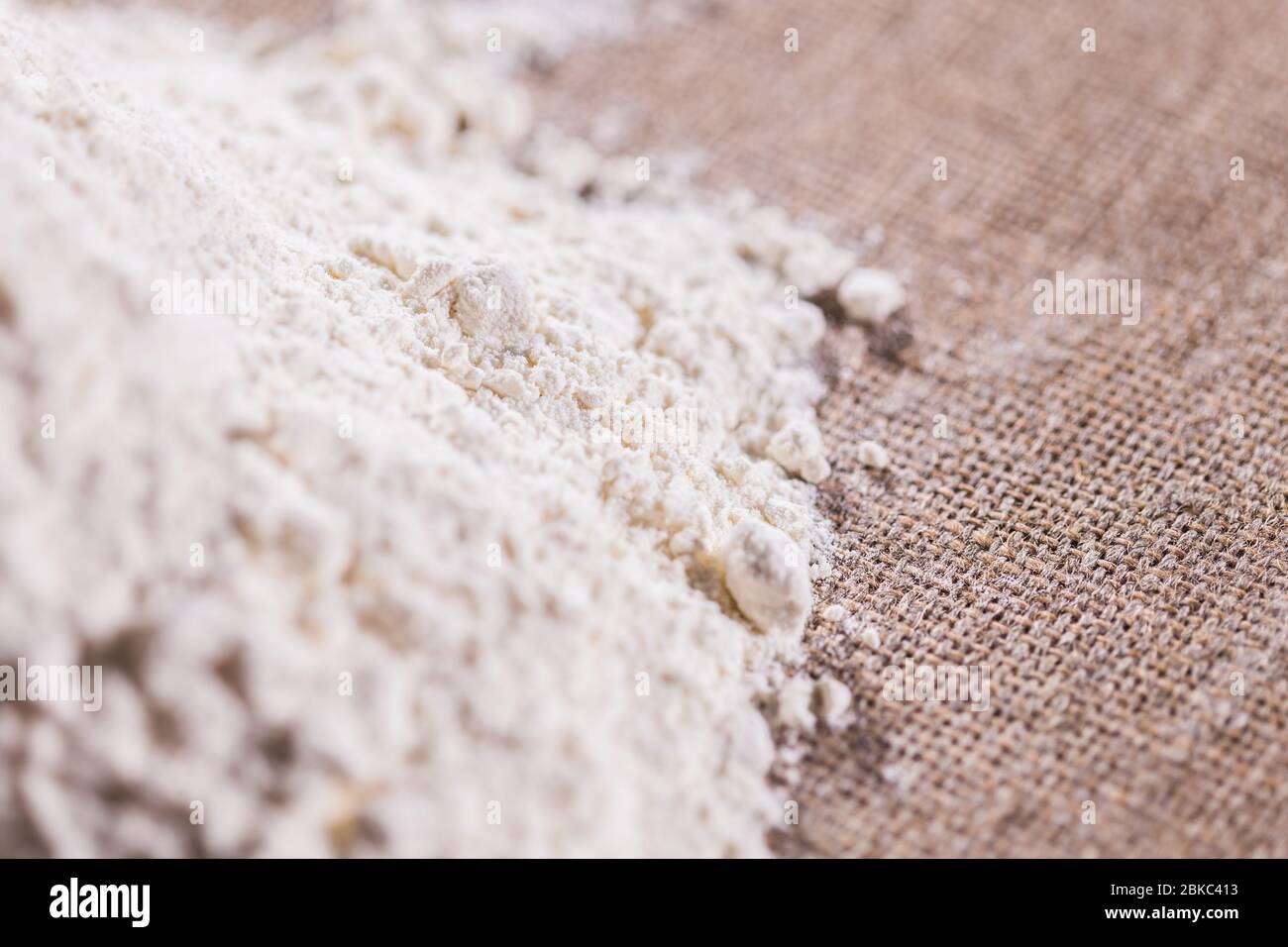 White flour on textile background texture photo Stock Photo - Alamy