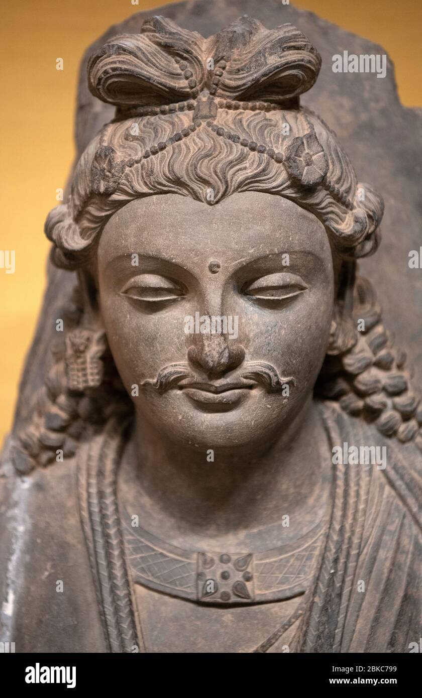 Bodhisativa Maitreya 2nd century AD from Gandhara sculpture Stock Photo ...