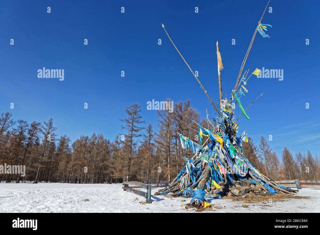 Ovoo in a forest lanscape. Ovoo are sacred stone heaps used as altars ...