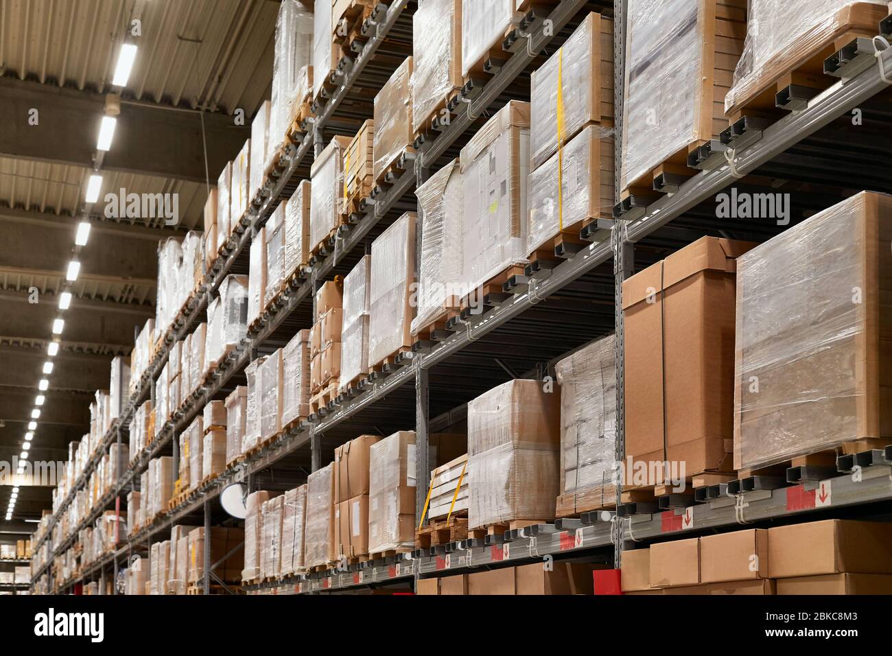 Warehouse with stocked shelves Stock Photo - Alamy