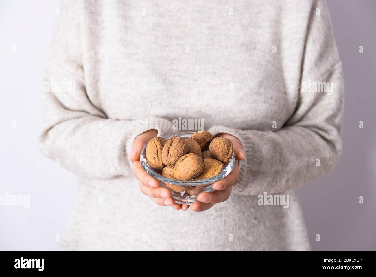 Walnuts woman hi-res stock photography and images - Alamy
