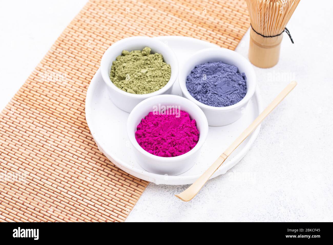 Green, blue and pink matcha powder Stock Photo - Alamy