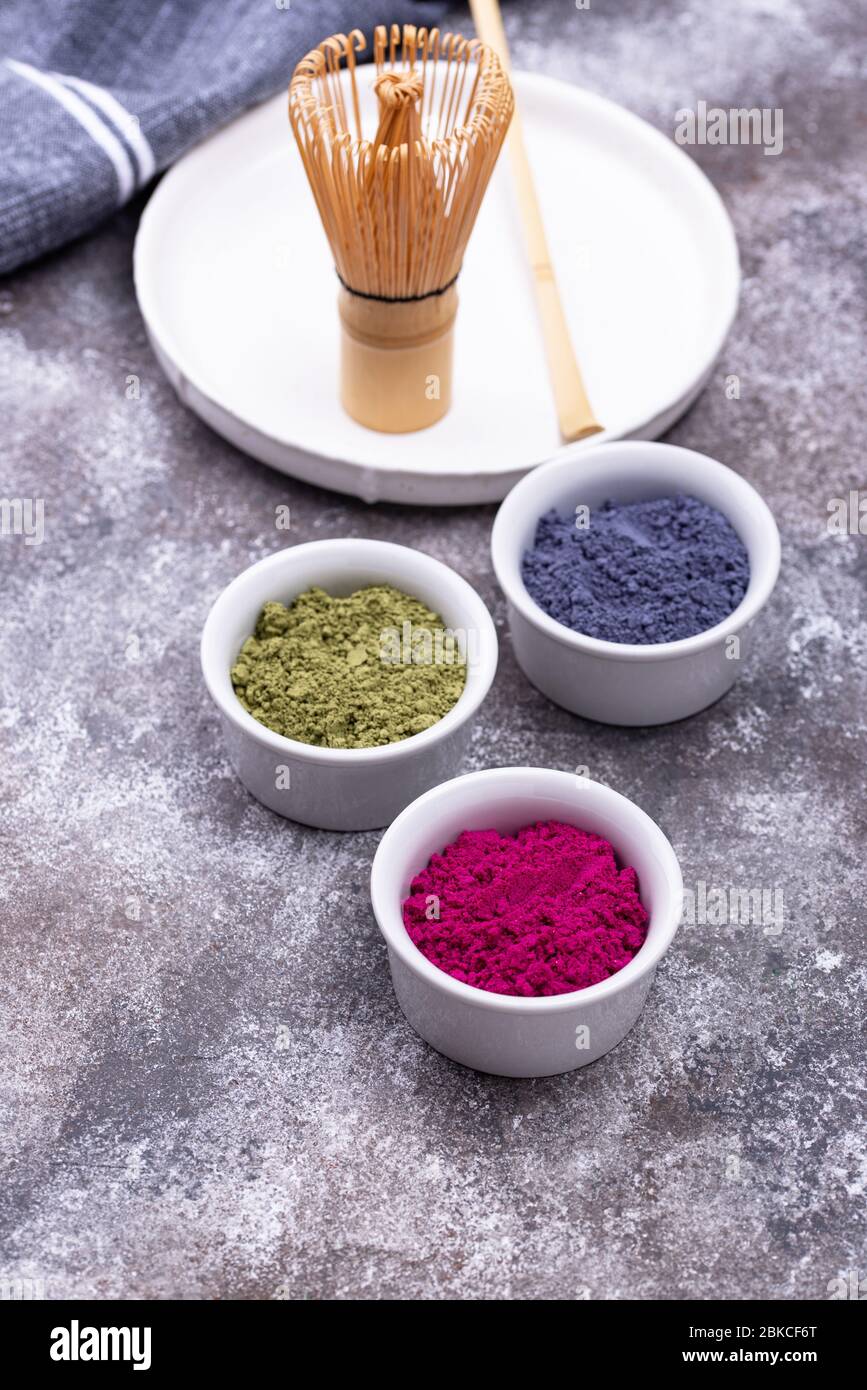Green, blue and pink matcha powder Stock Photo - Alamy