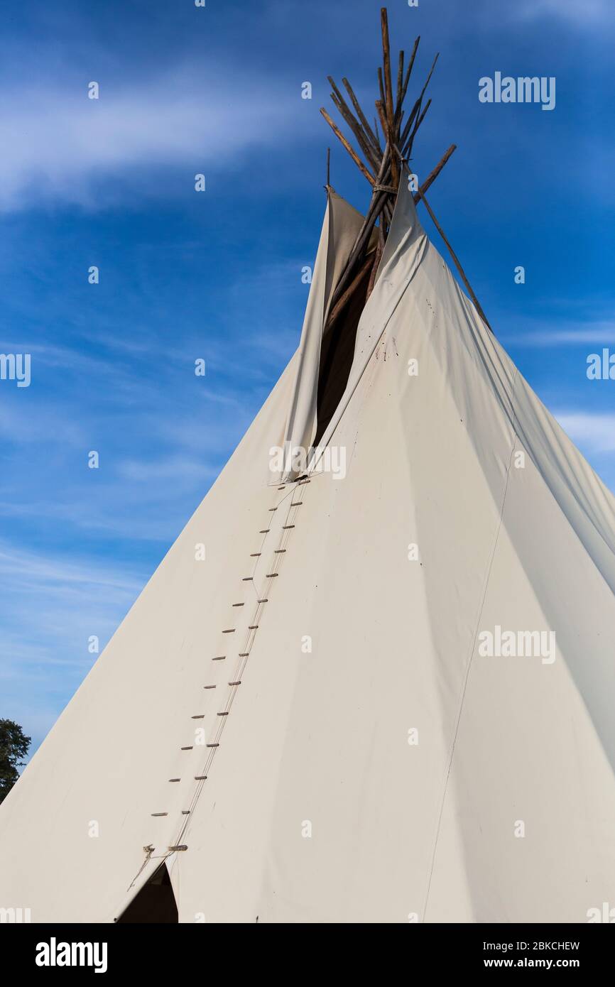 Magnificent tipi against blue summer sky, glamping at Wowo's, a family ...