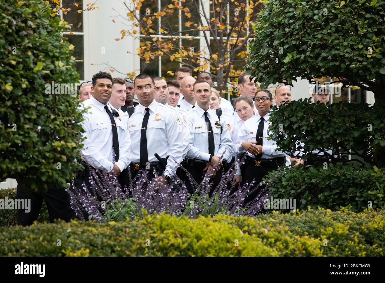 U.S. Secret Service officers observe as President Trump boards Marine ...