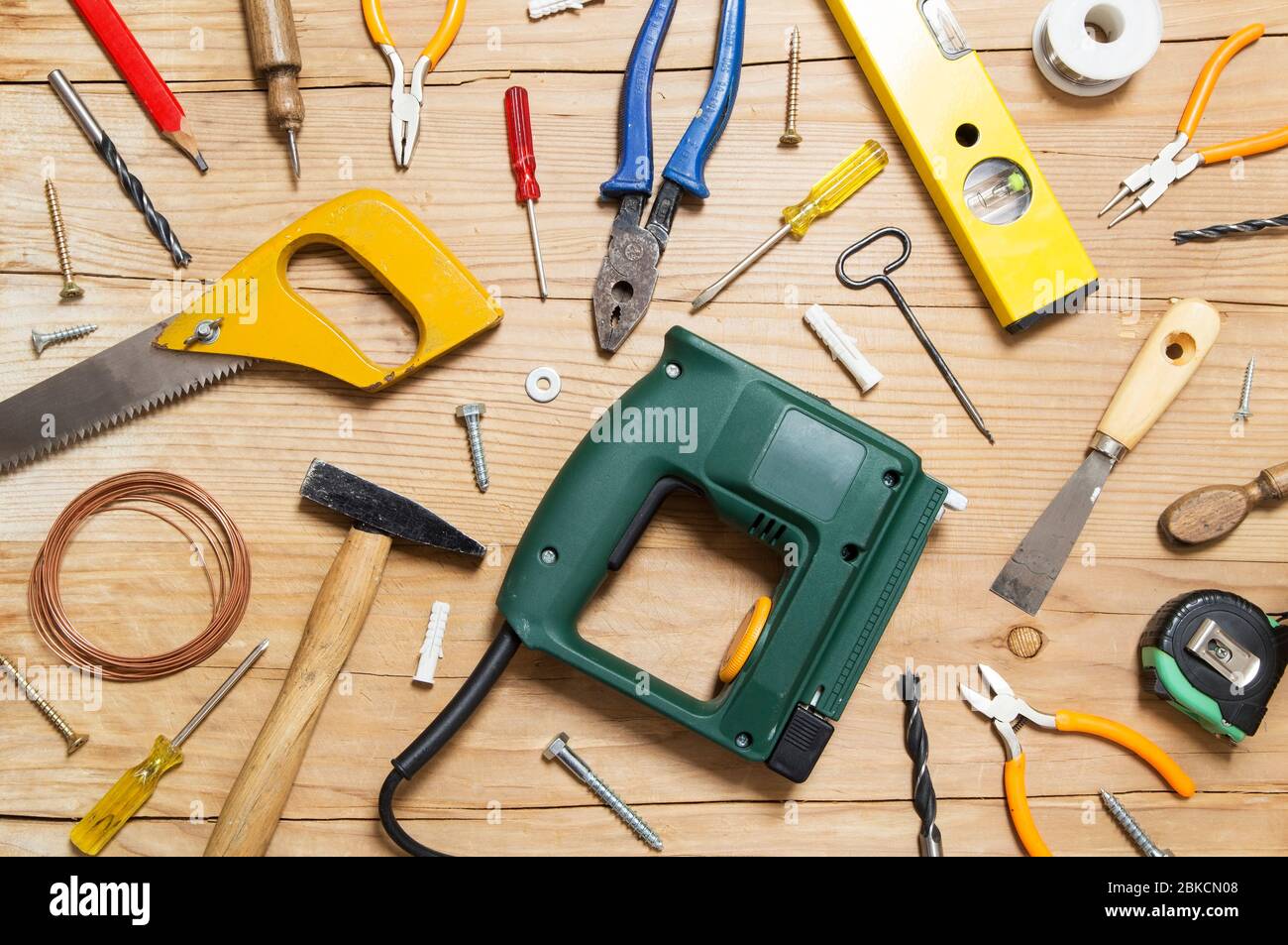 Various tools on wooden background Stock Photo - Alamy