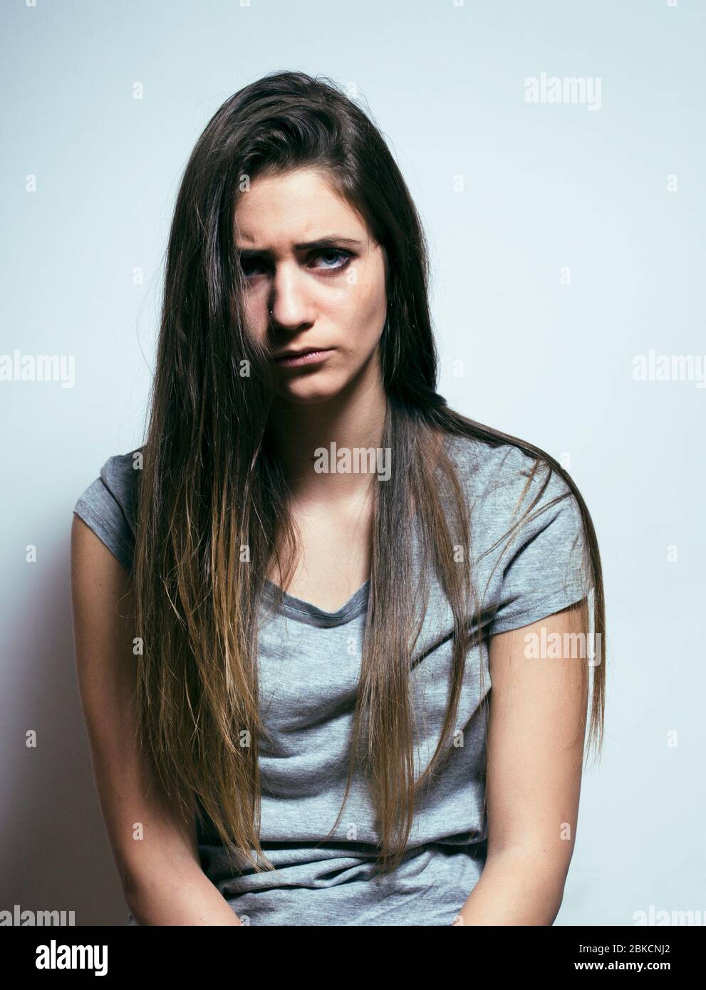 problem depressed teenage with messed hair and sad face Stock Photo - Alamy