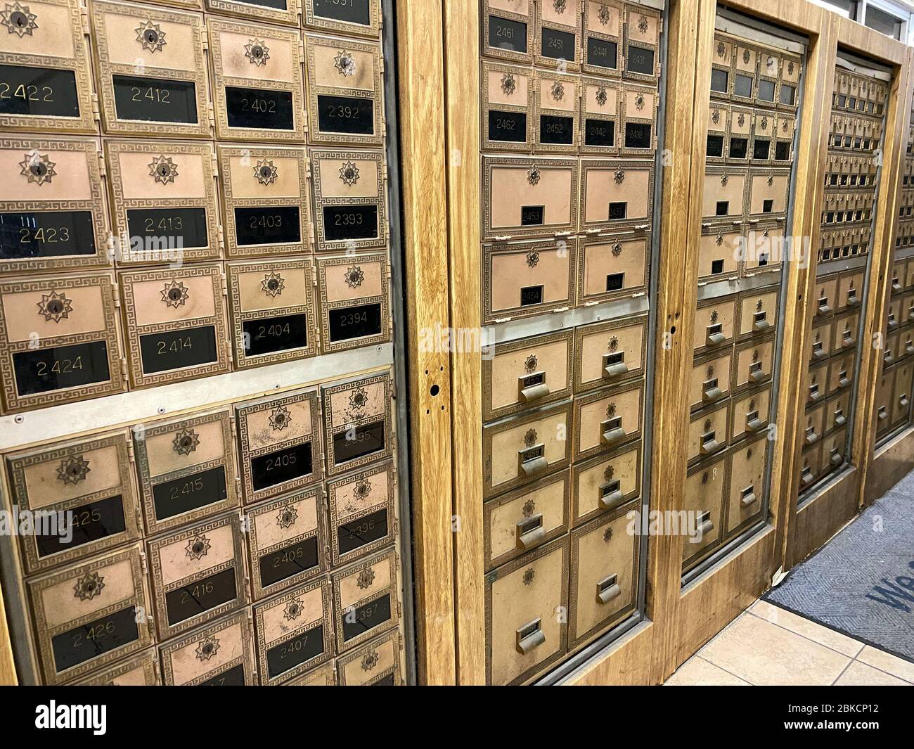 An indoor row of vintage post boxes Stock Photo - Alamy