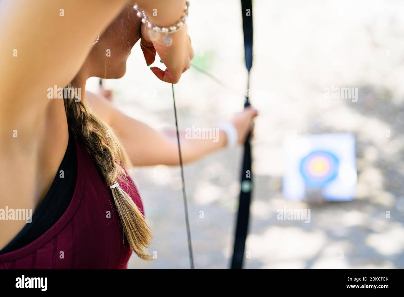 Beautiful woman aiming bow arrow hi-res stock photography and images ...