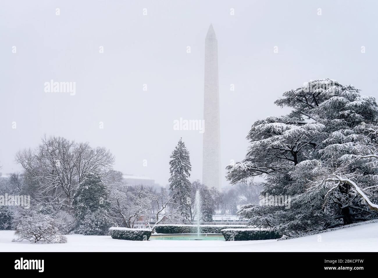 The White House grounds are covered in snow on January 13, 2019, in ...
