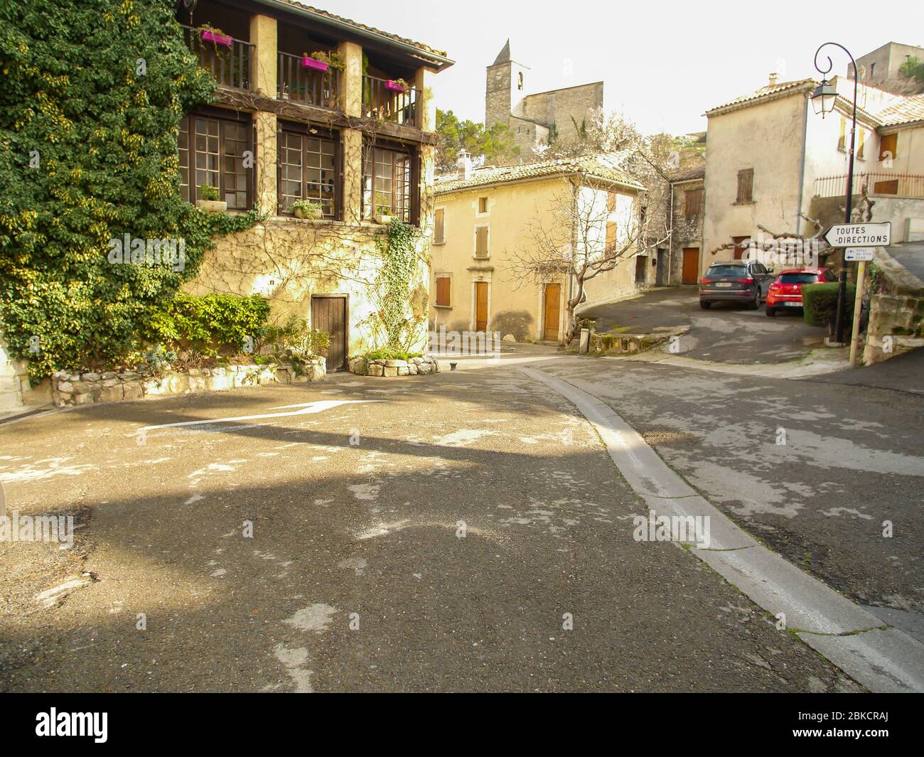 Colorful and narrow street in Provence village Stock Photo - Alamy