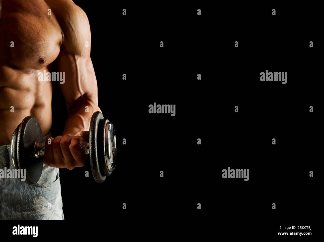 Close-up of a power fitness man's biceps. Muscular bodybuilder guy ...