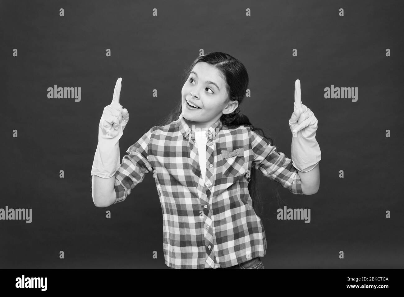 Lets do some work. Happy girl got idea. Little child wear rubber gloves ...