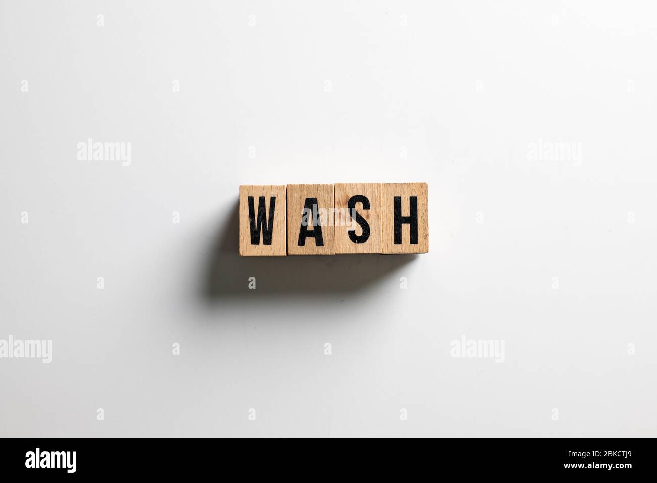 " wash " text made of wooden cube on White background Stock Photo - Alamy