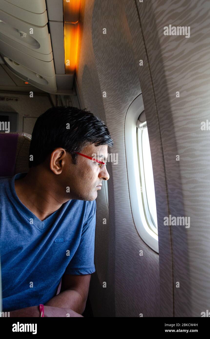 Aeroplane window and adult face hi-res stock photography and images - Alamy