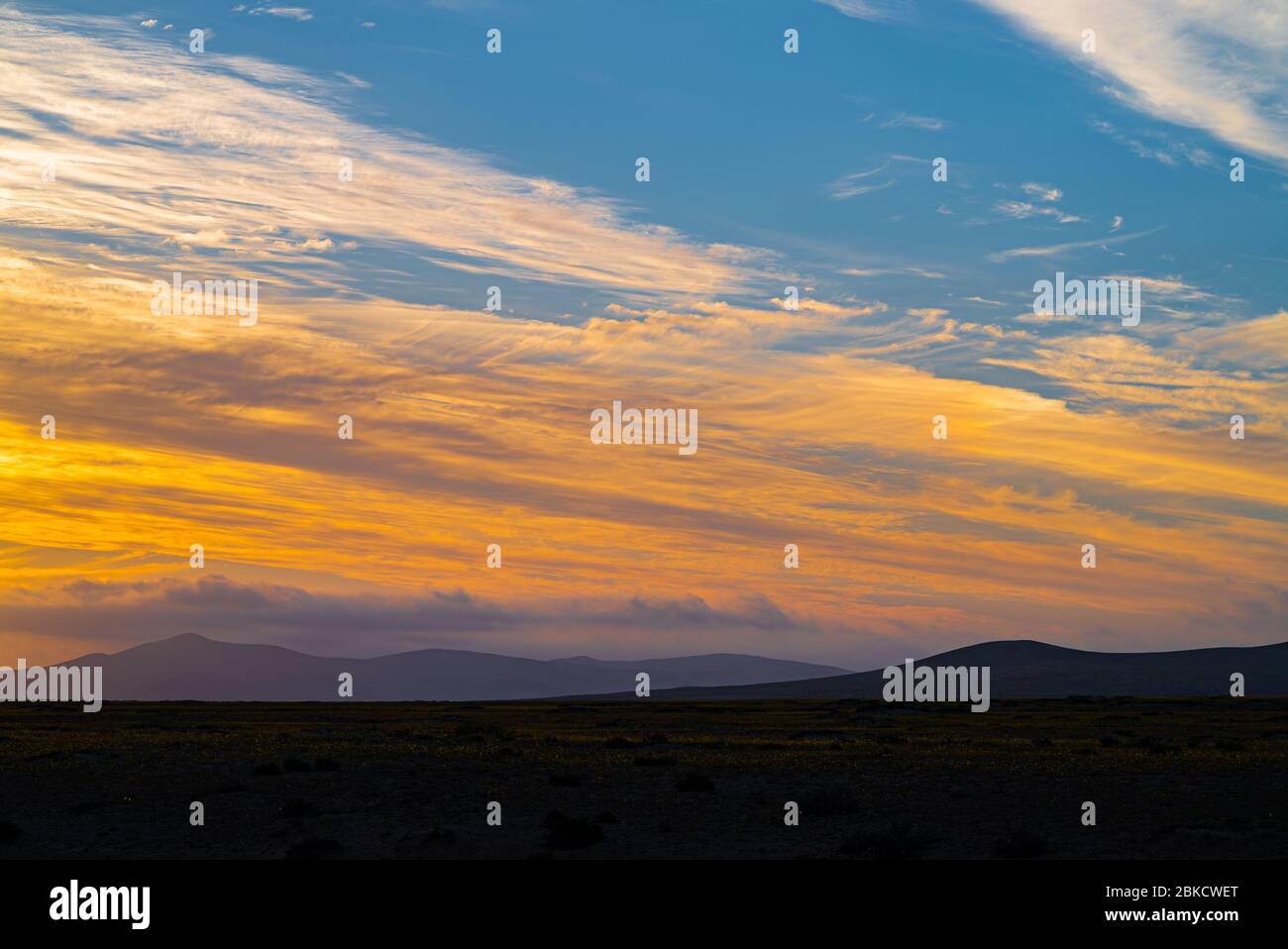 sunset colors reflected in the clouds, in the atacama desert Stock ...