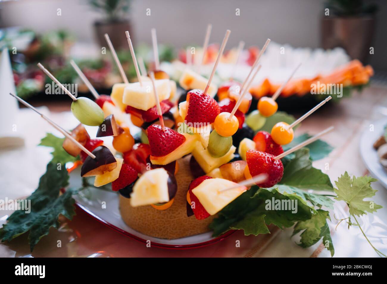 photo of different types of fruits on a stick Stock Photo - Alamy