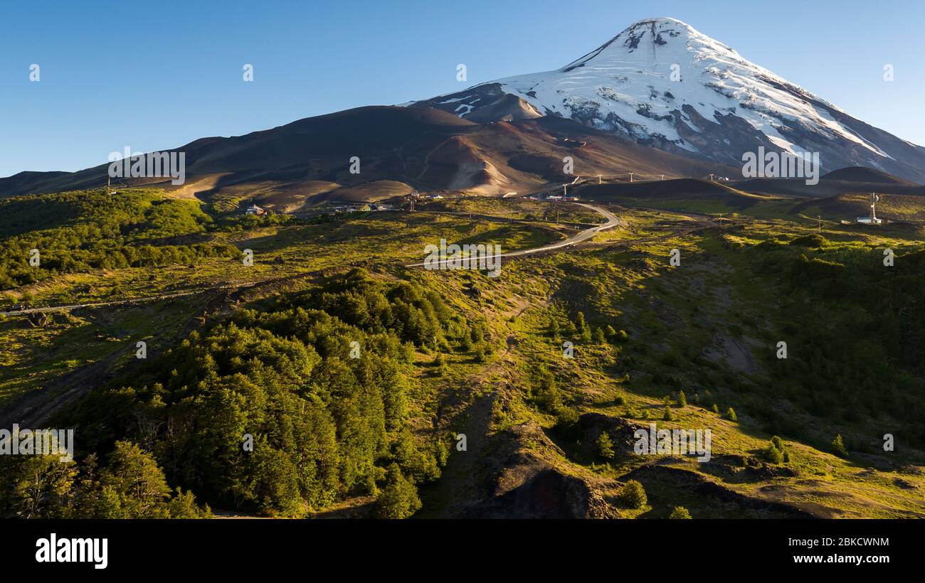 Path leading to the foot of the Osorno volcano, all green and snowless ...