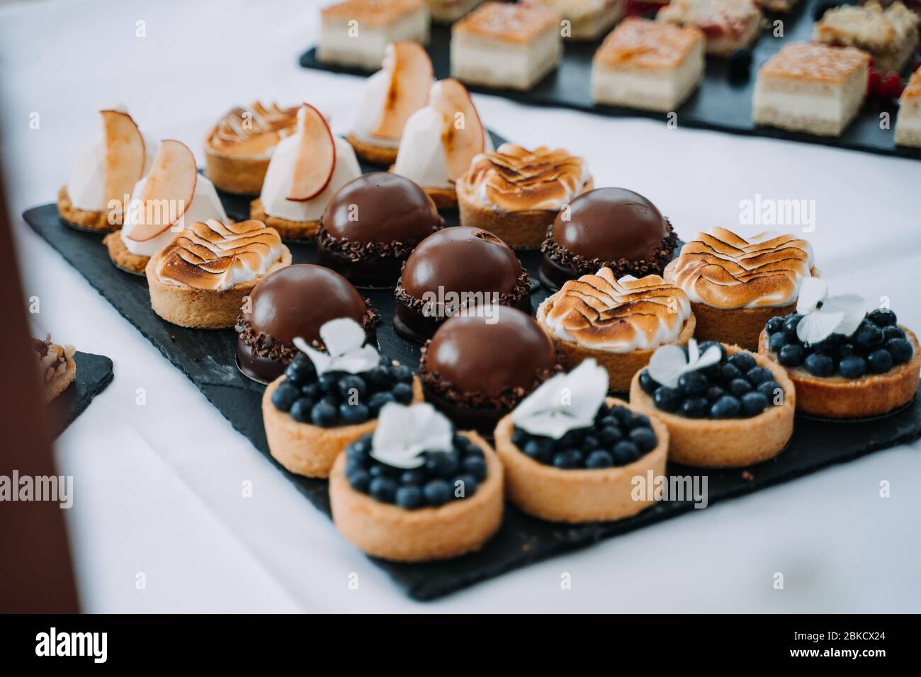 photo of many delicious good looking small tarts Stock Photo - Alamy