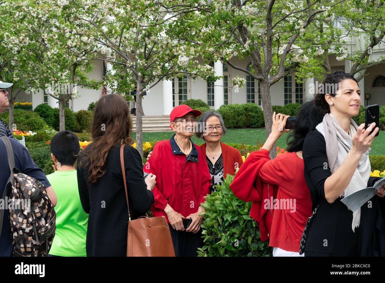 Visitors explore the White House gardens during the 2019 Spring Garden Tours, an annual event ...