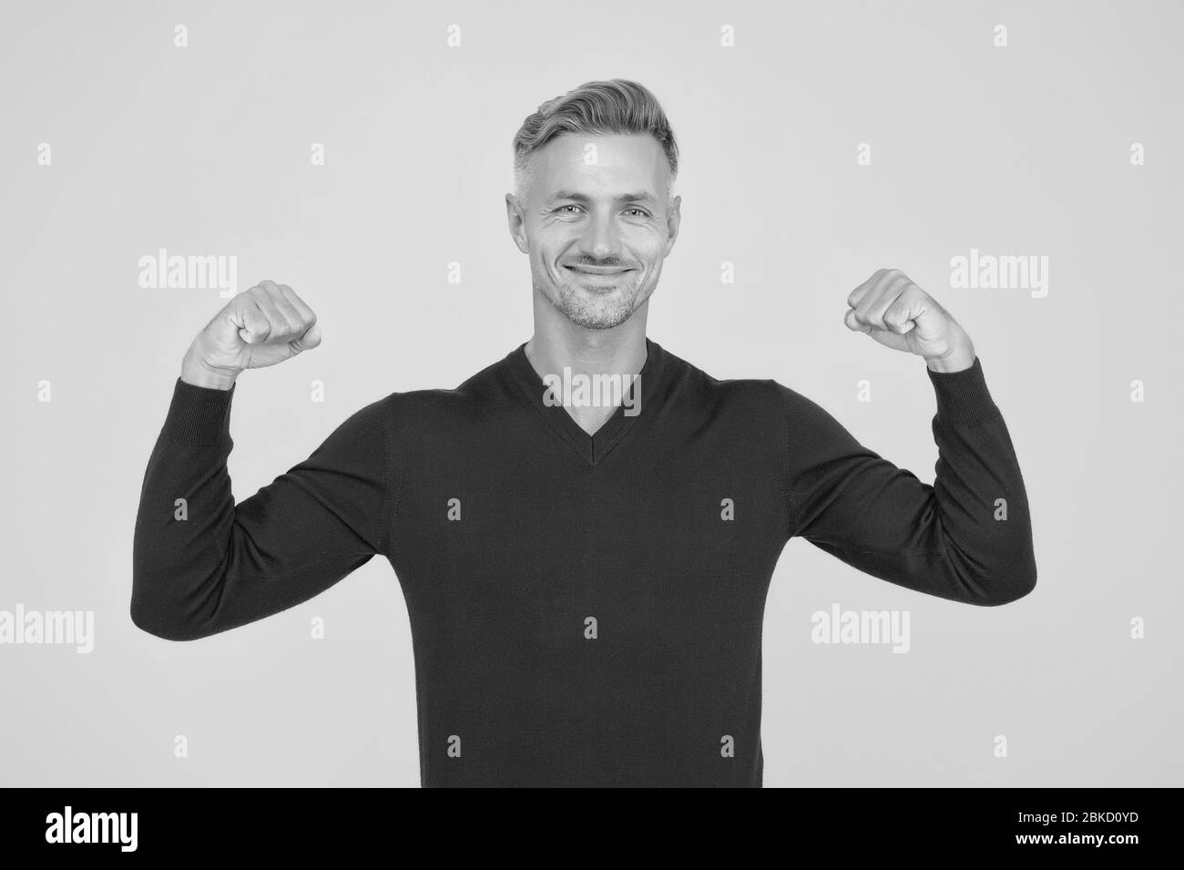 Confidence is best outfit. Confident man yellow background. Handsome ...
