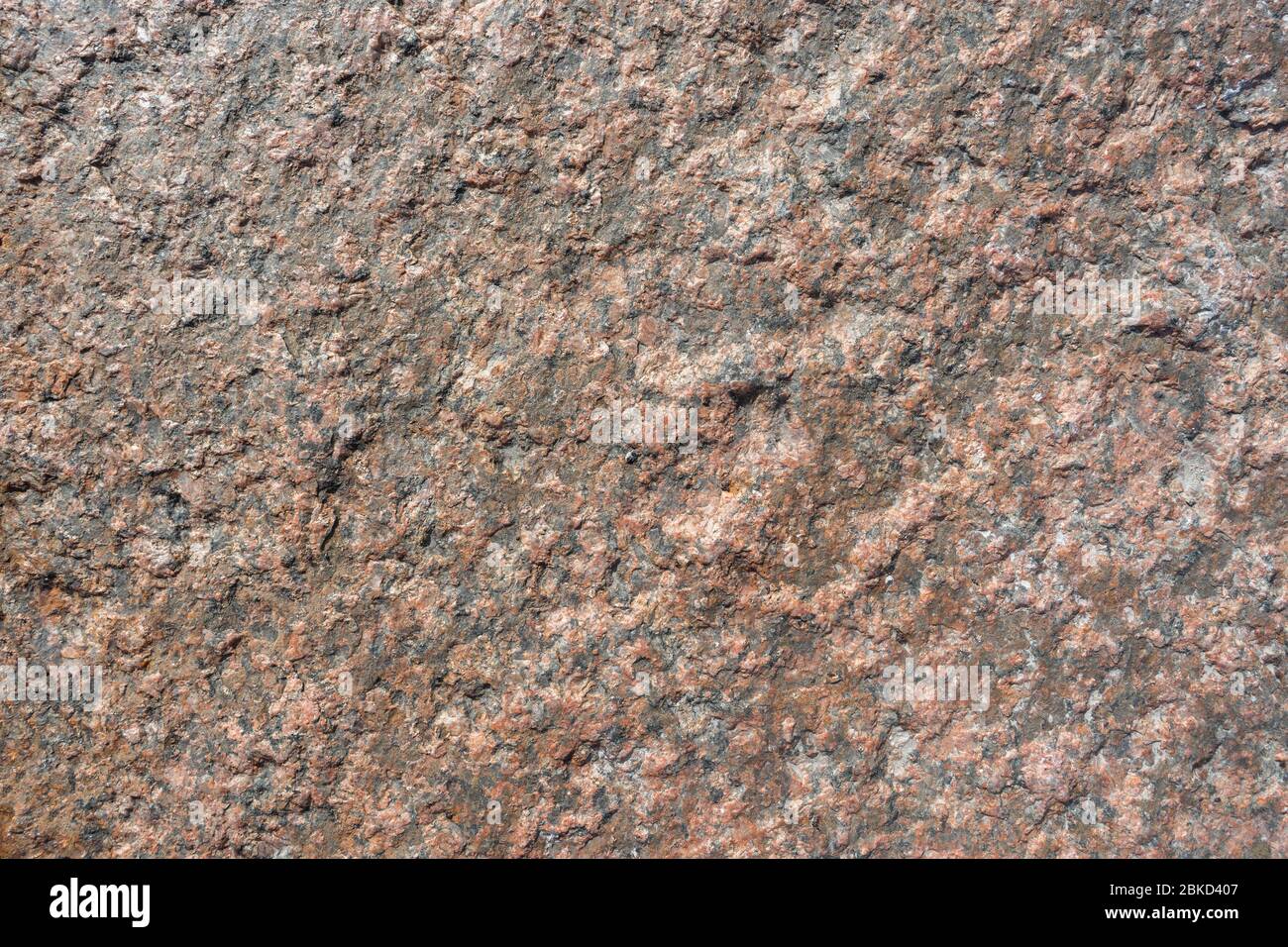Natural untreated granite stone surface for background Stock Photo - Alamy