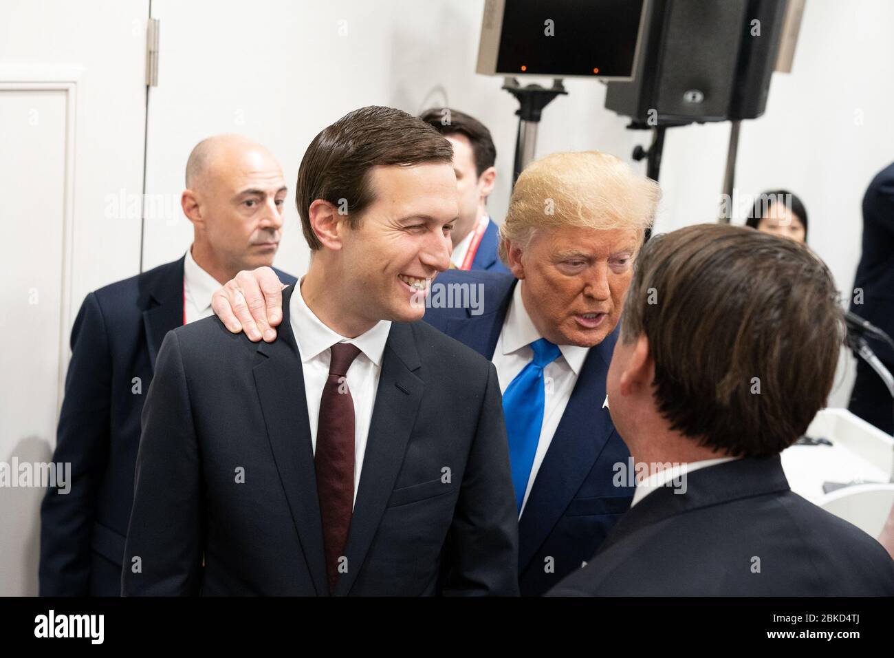 President Donald Trump speaks with Senior Advisor to the President ...