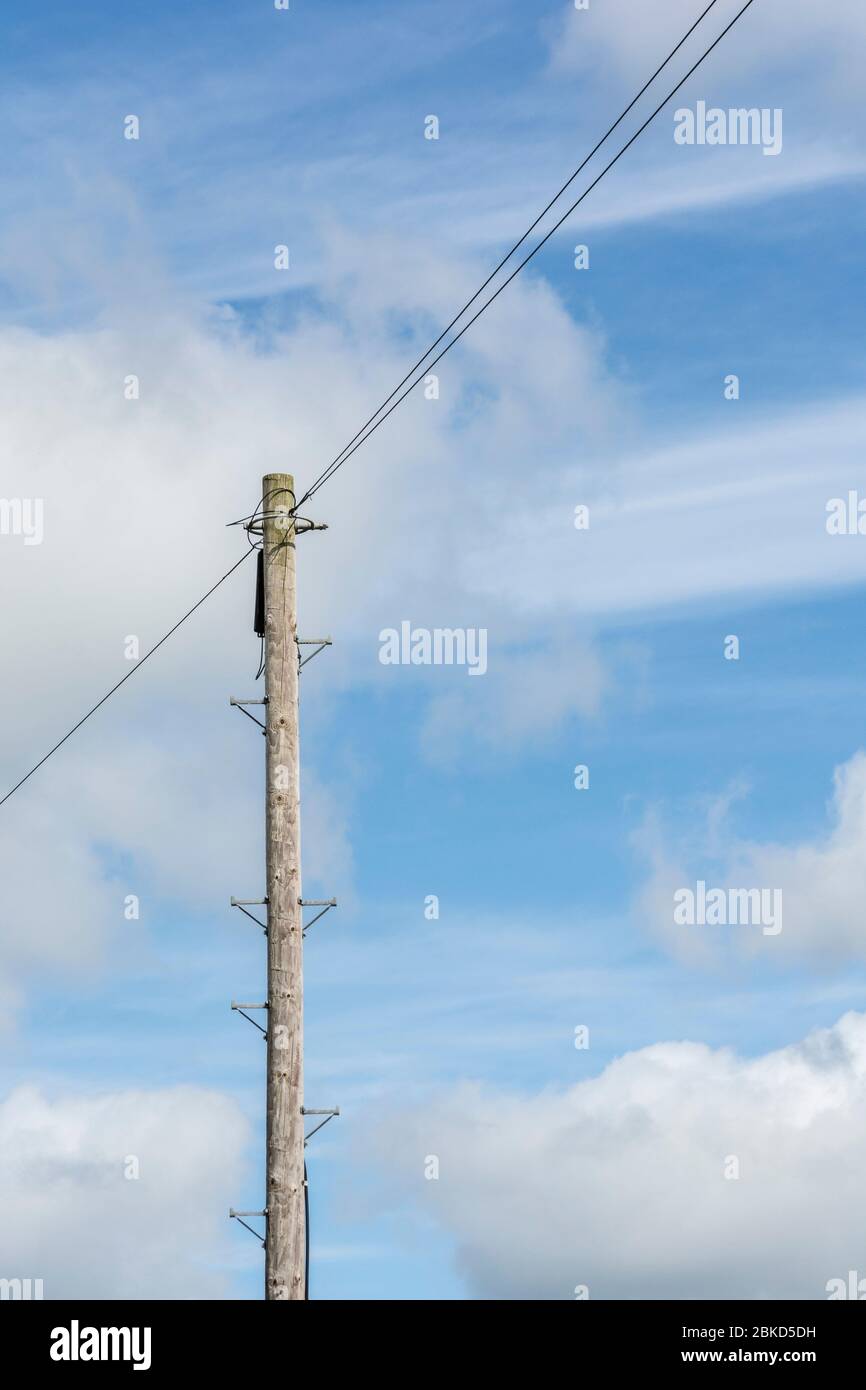 Blue sky with rural telephone pole and wires - & possibly a broadband ...