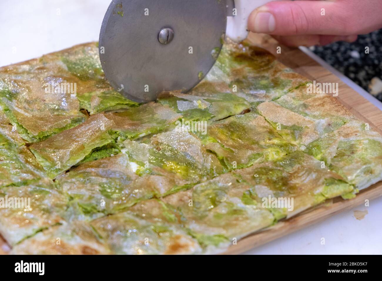 Delicious Turkish sweet, katmer with green pistachio nuts Stock Photo ...