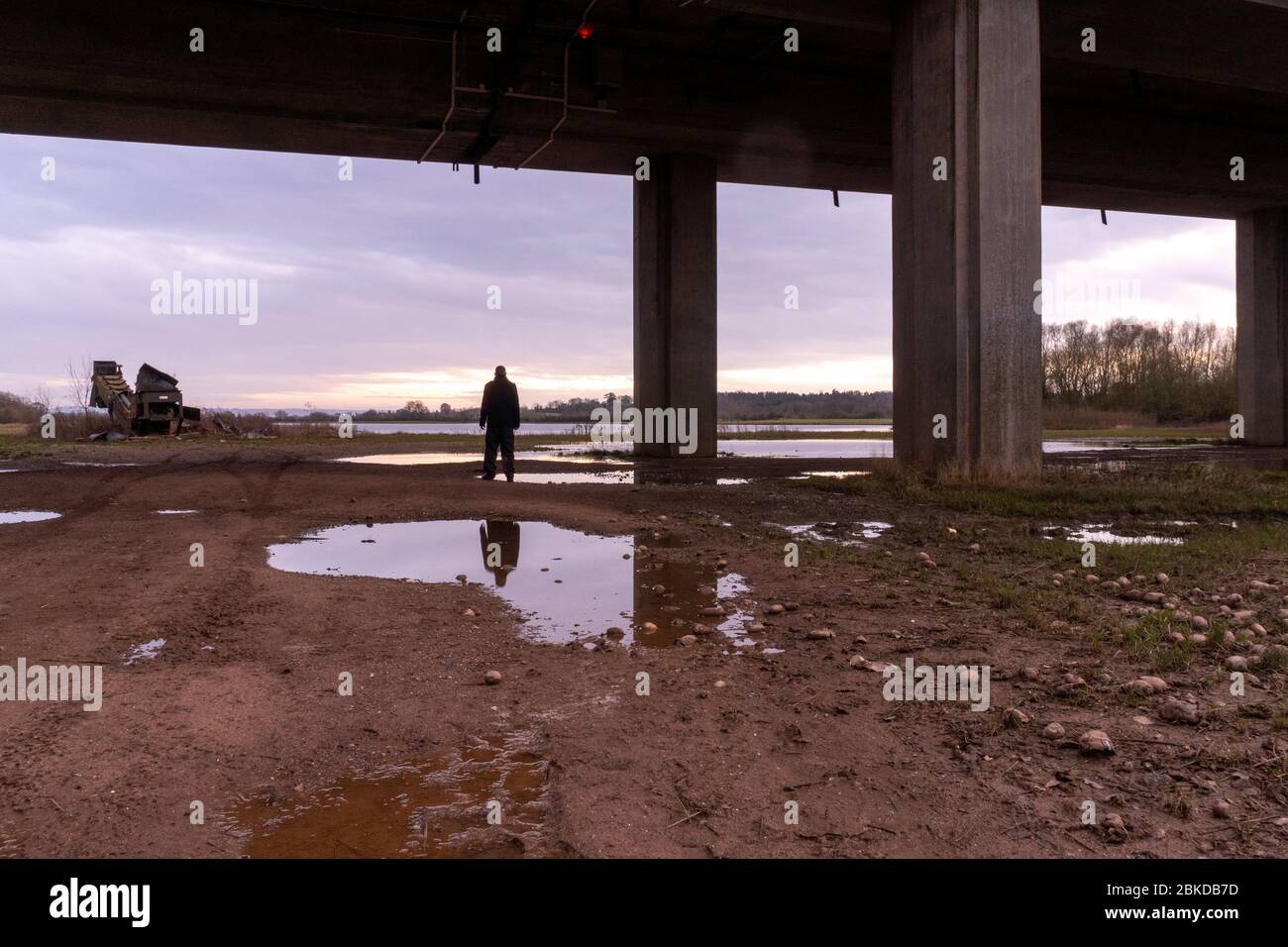 Person reflected in puddle hi-res stock photography and images - Alamy