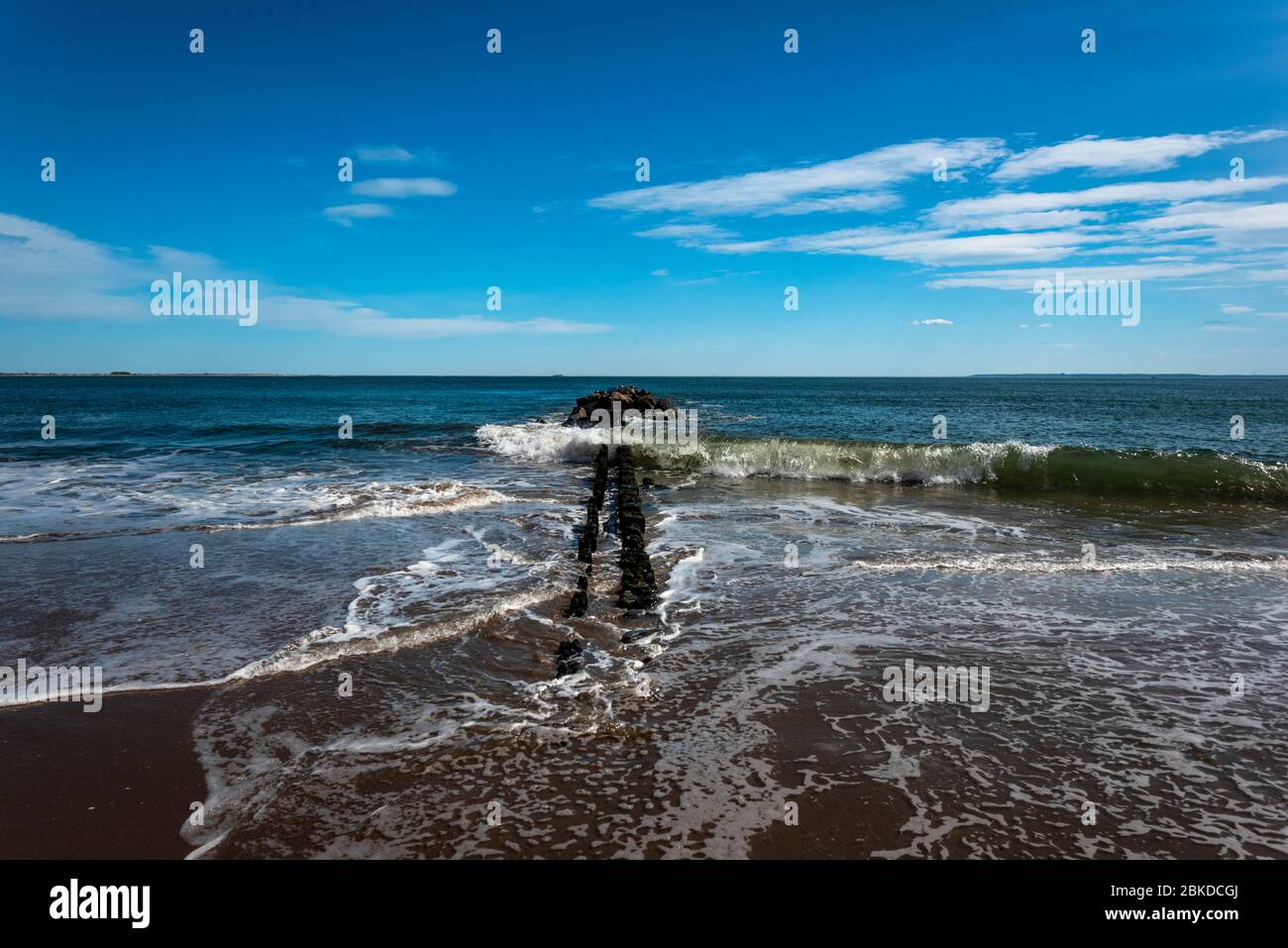 Listening to the ocean waves on a sunny spring day on the Brighton ...