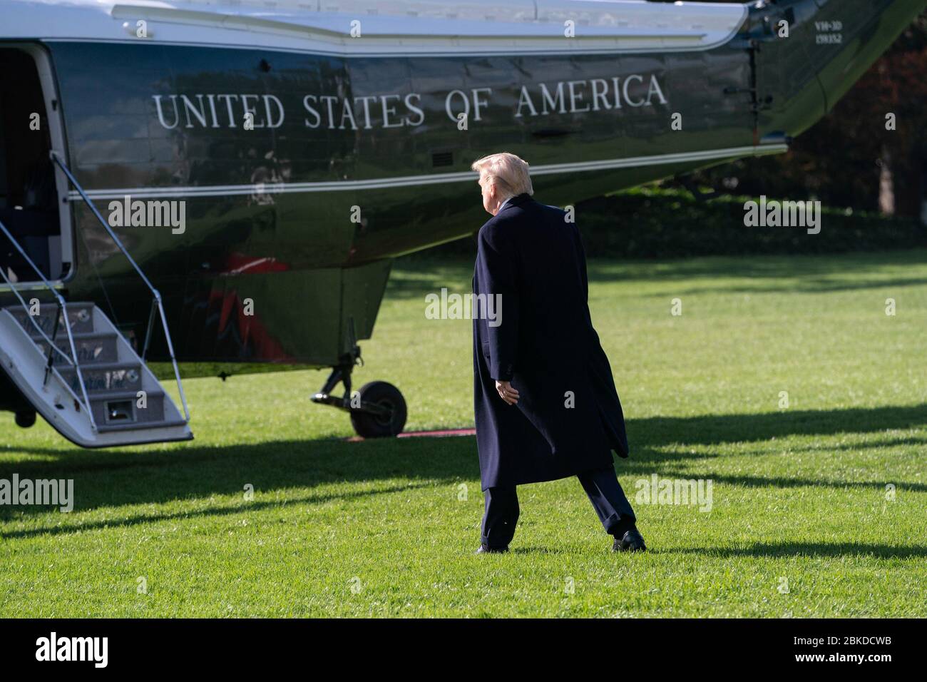 President Donald J. Trump walks across the South Lawn of the White ...