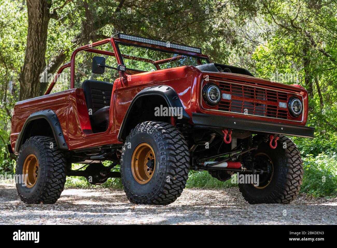Convertible vintage truck has huge knobby tires and capable of ...