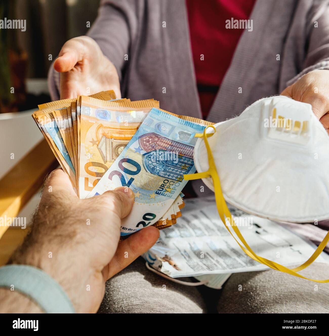 Man offering money to a woman hi-res stock photography and images - Alamy