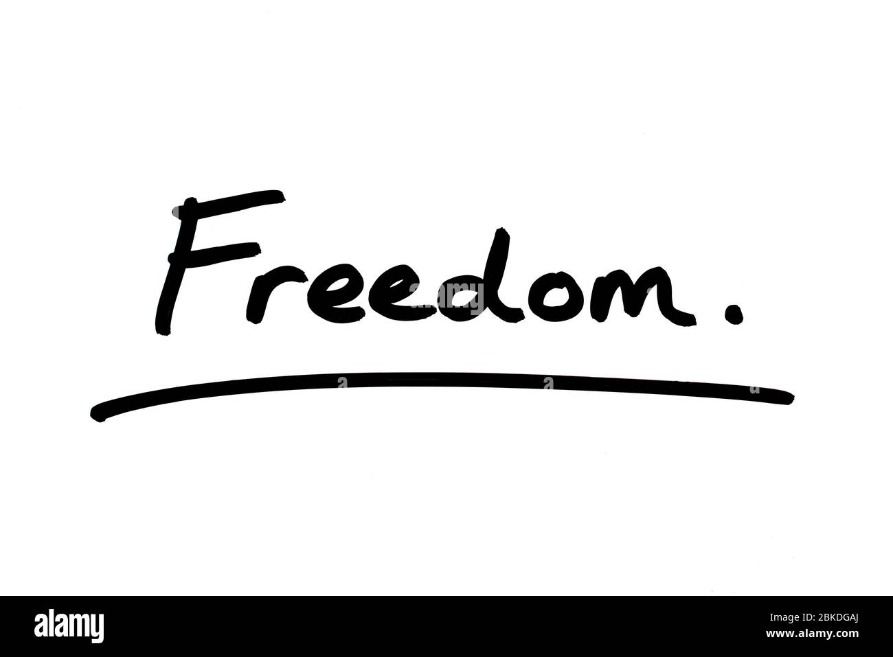 Freedom handwritten on a white background Stock Photo - Alamy