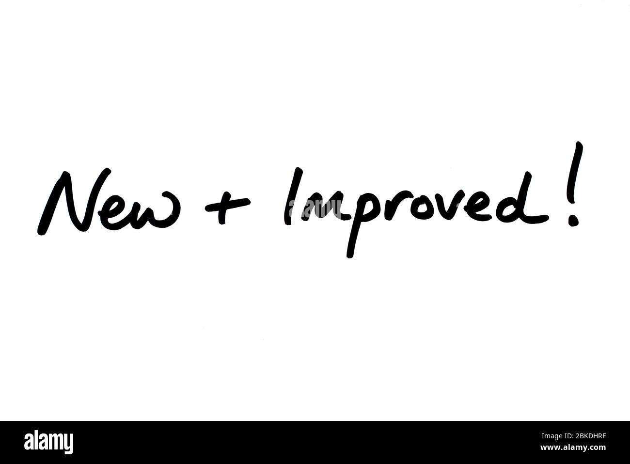 New and Improved! handwritten on a white background Stock Photo - Alamy