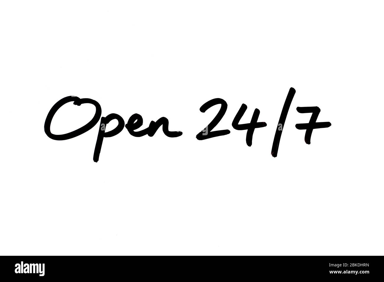 Open 24-7 handwritten on a white background Stock Photo - Alamy