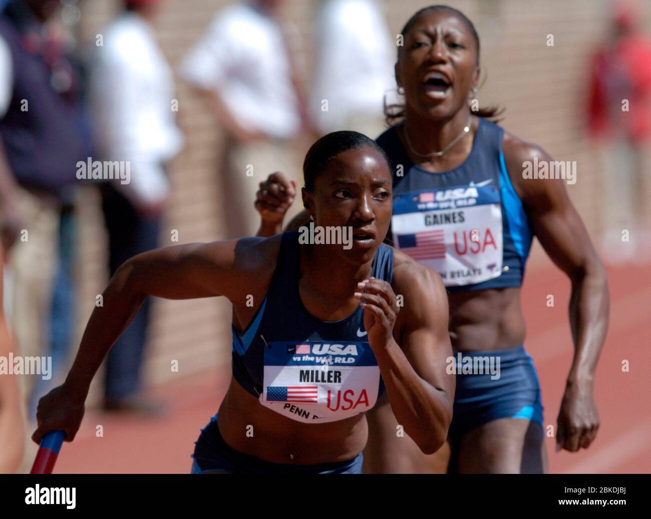 Philadelphia, United States. 24th Apr, 2004. Inger Miller takes handoff ...