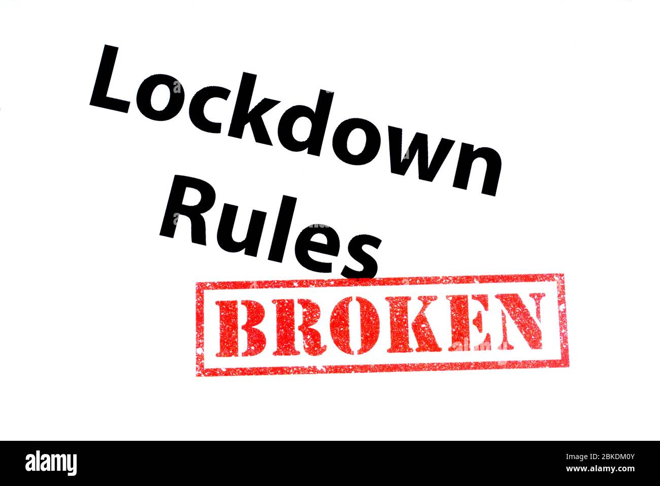 Lockdown Rules heading with a red BROKEN rubber stamp Stock Photo - Alamy