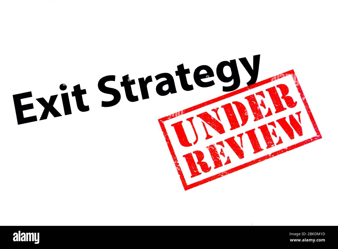 Exit Strategy heading with a red UNDER REVIEW rubber stamp Stock Photo ...