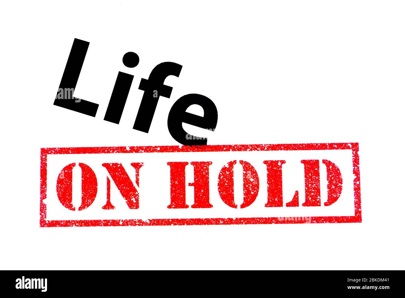 Life heading with a red ON HOLD rubber stamp Stock Photo - Alamy