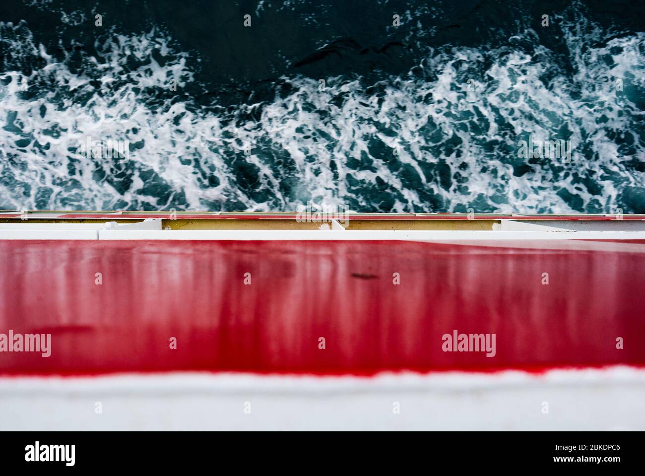 Abstract top view of a bow wave made by a ship at sea. selective focus ...