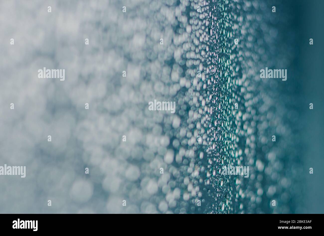 Blurred and focus of rain drop on glass window in monsoon season for ...