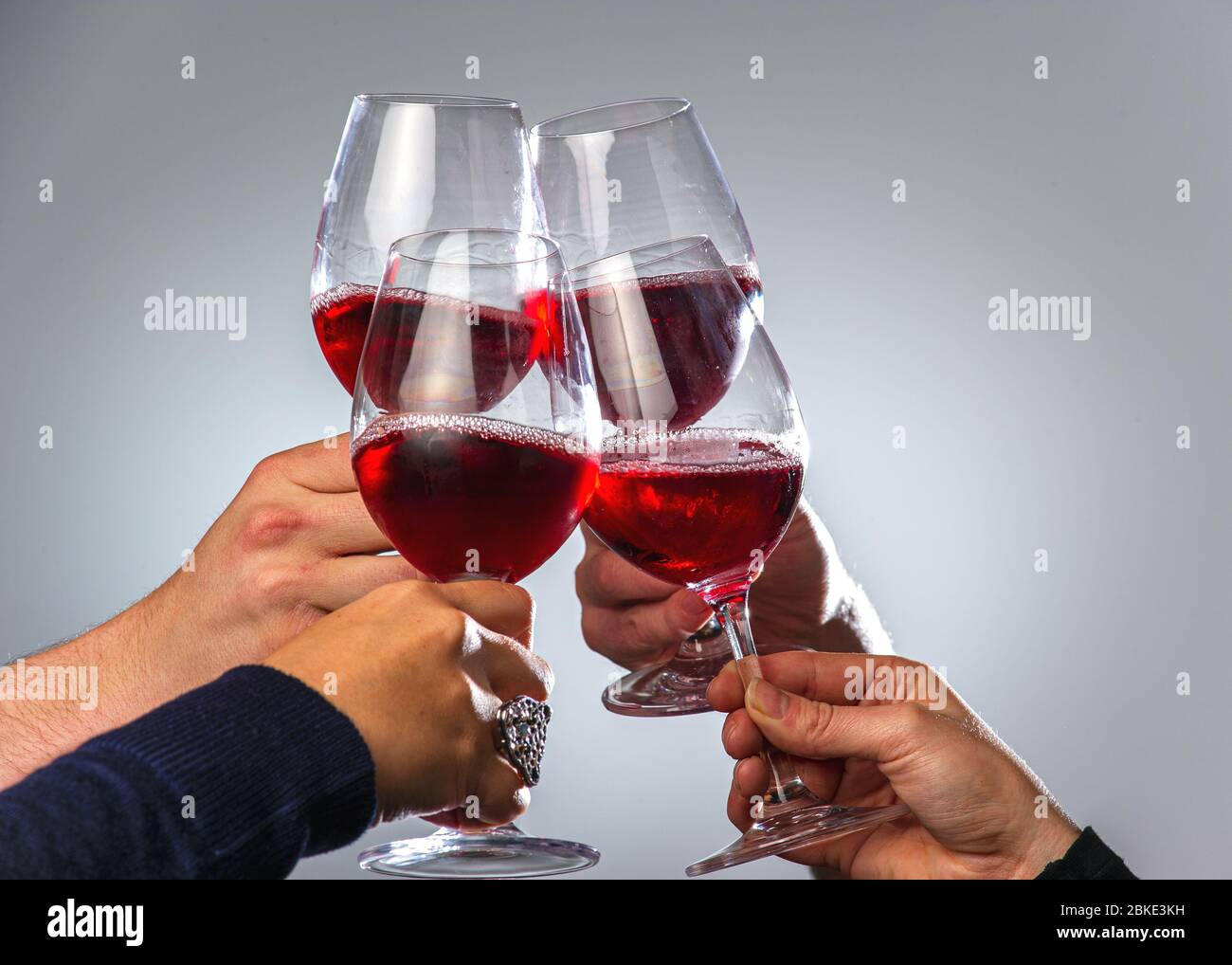 Human hands toasting drinking glasses hi-res stock photography and ...